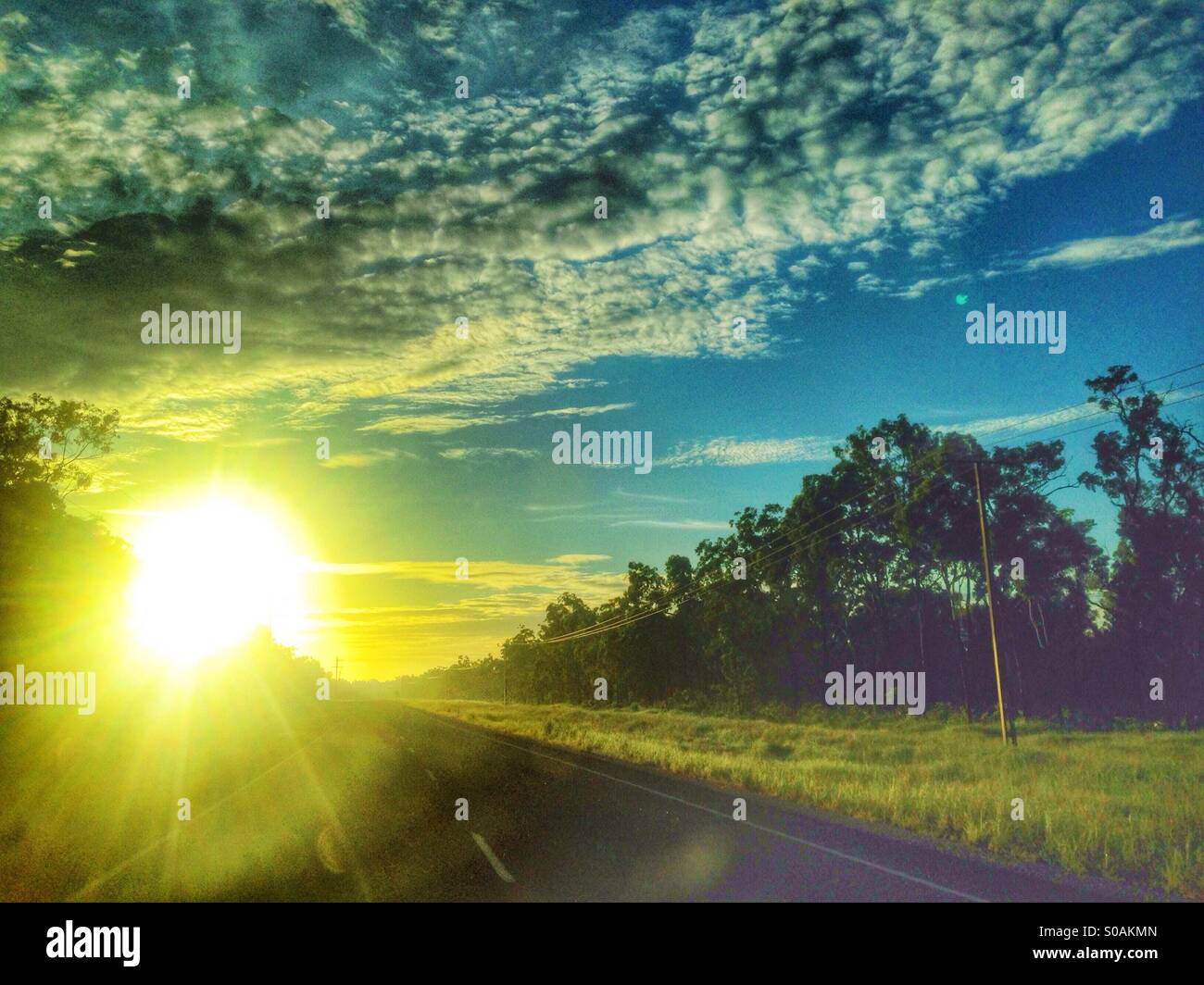 Sunrise on a country road in the Australian bush Stock Photo - Alamy