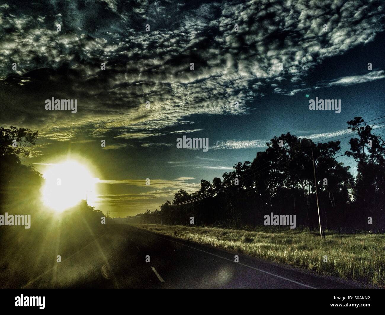 Sunrise on a country road in the Australian bush Stock Photo - Alamy