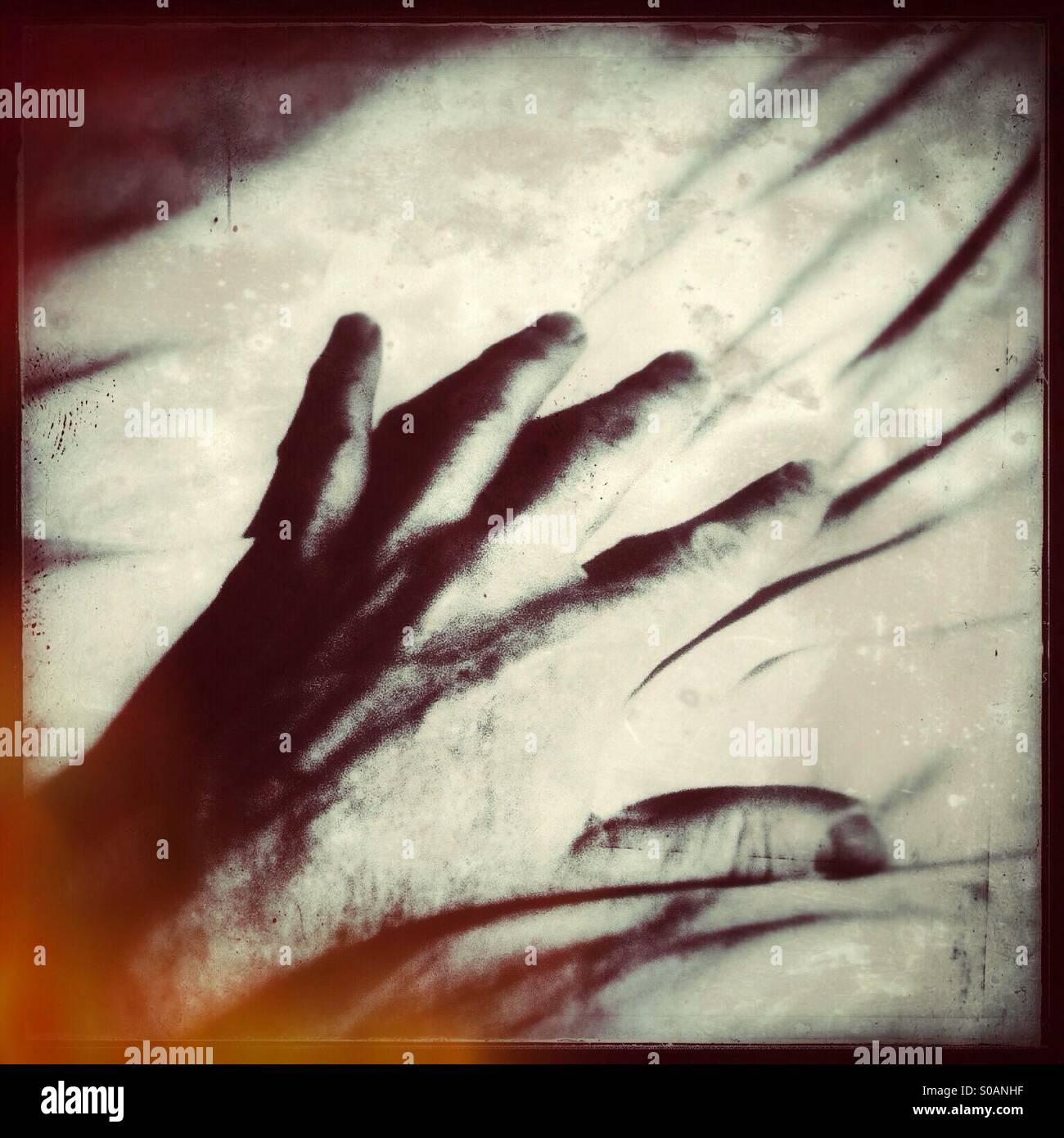 Hand Reaching Down Into Darkness