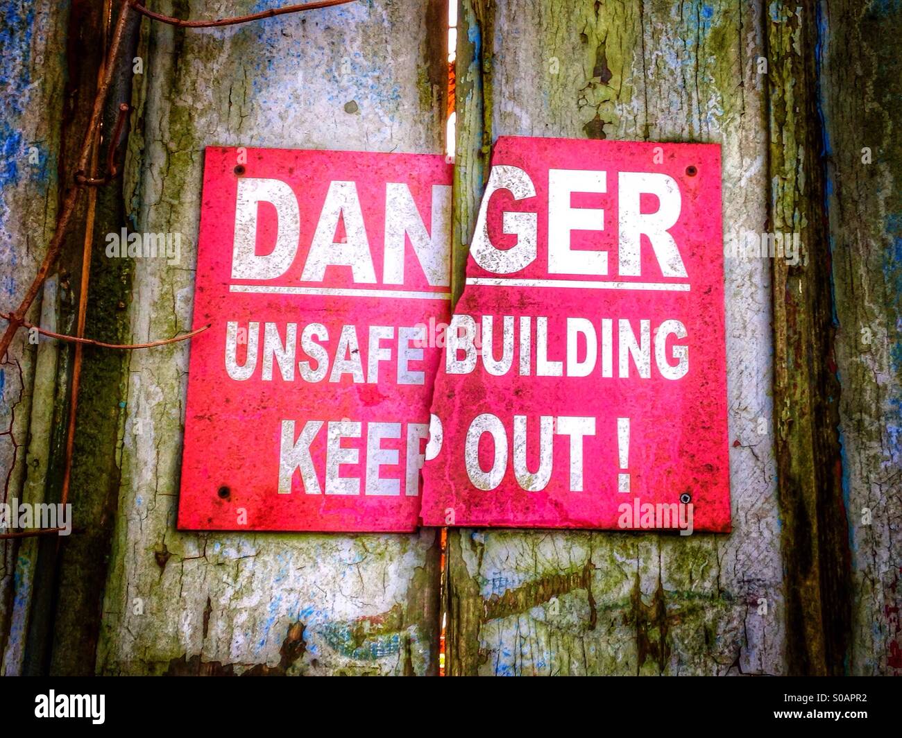 Broken danger sign Stock Photo - Alamy