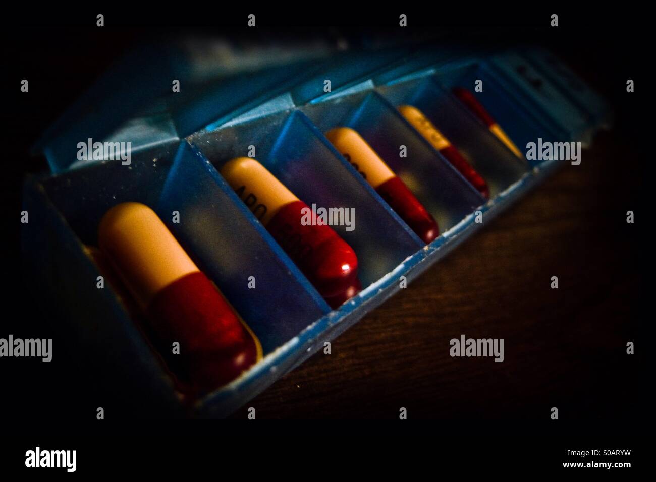 Antibiotics in a weekly dispenser Stock Photo - Alamy