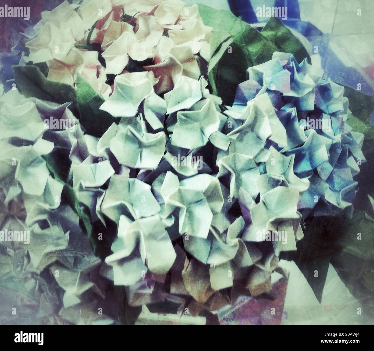 Hydrangea flowers folded in traditional Japanese technique of origami ...