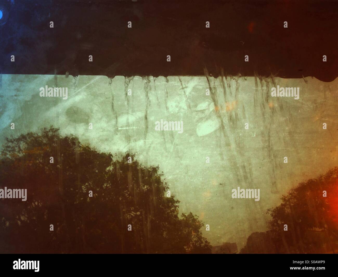 Monsoonal rain falling from the roof Stock Photo - Alamy