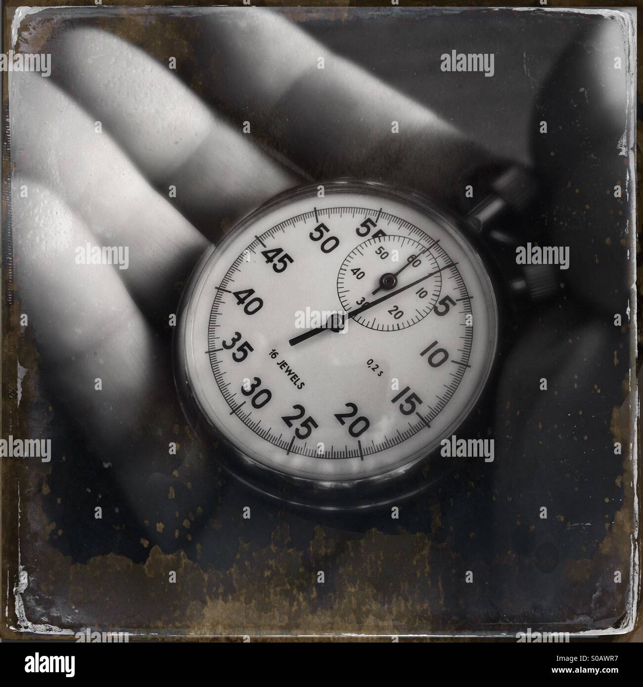 Stopwatch in hand Stock Photo - Alamy