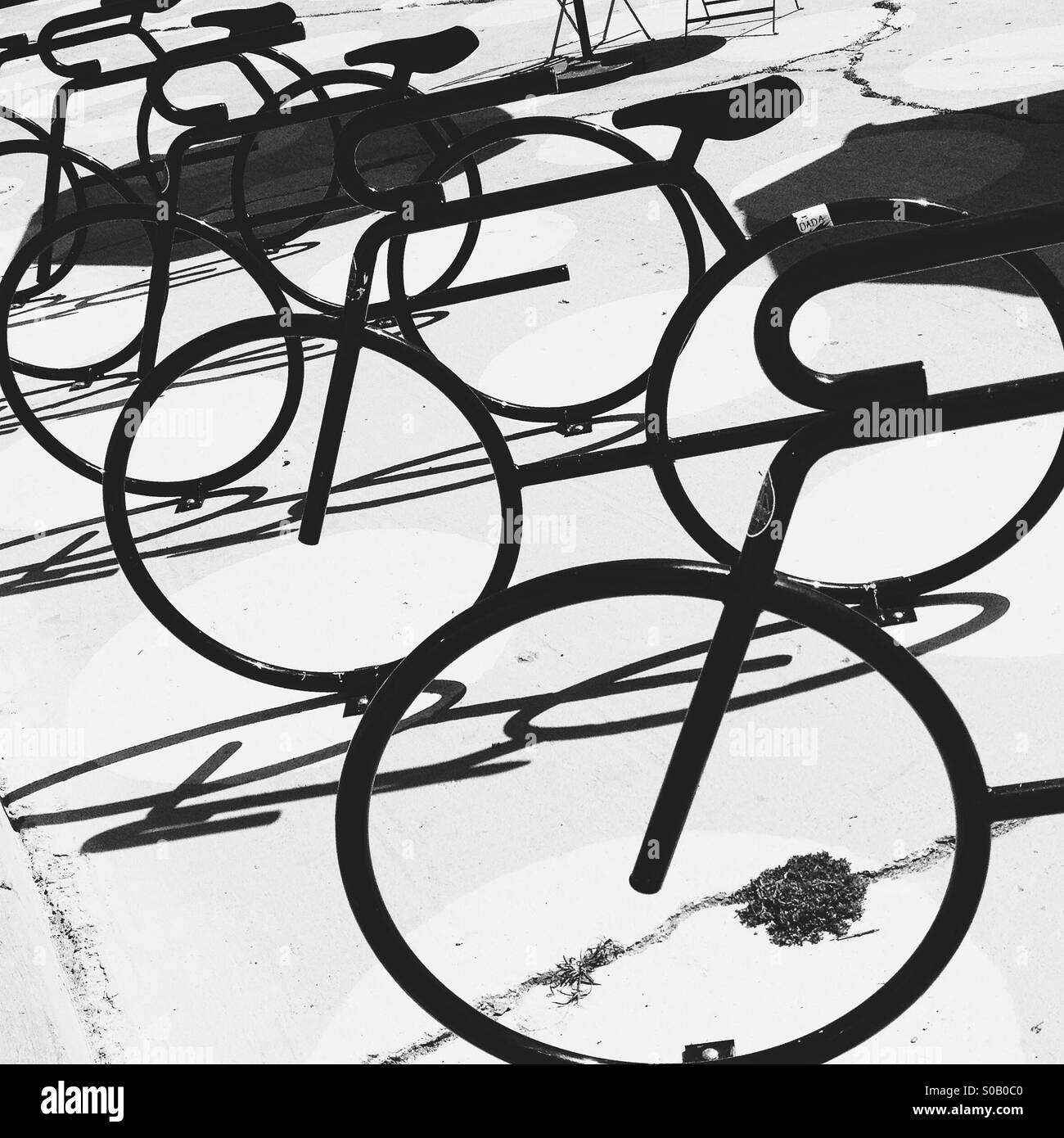 Bicycle shaped bike racks Stock Photo - Alamy