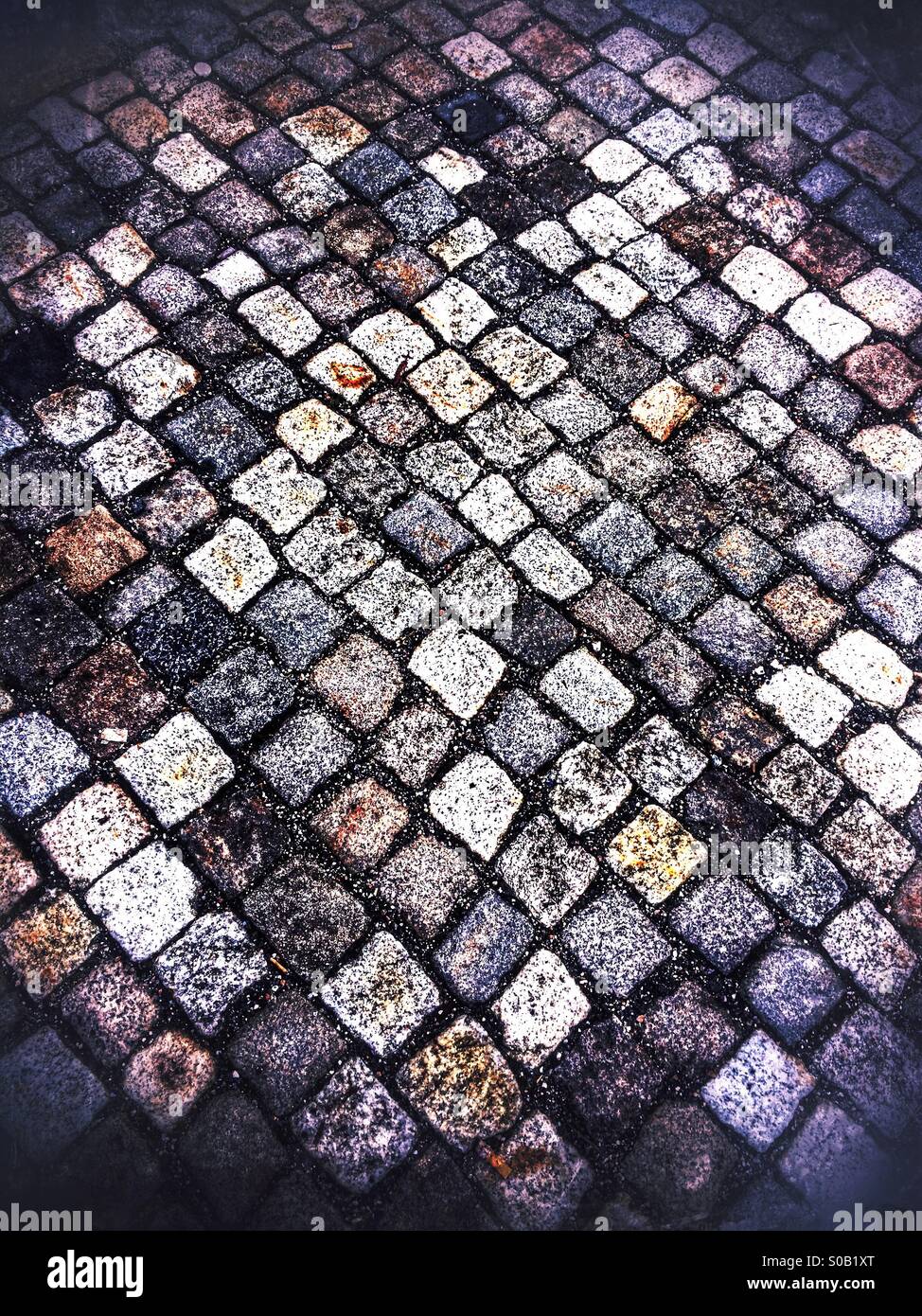 Aged cobblestone pavement Stock Photo - Alamy