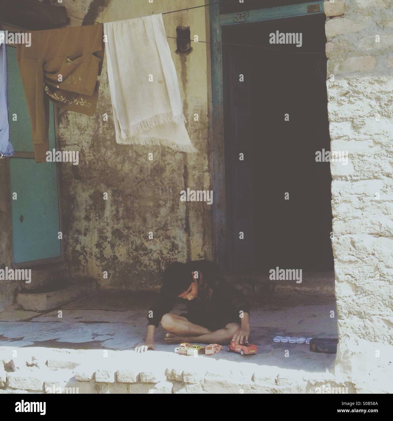 Poor Kid High Resolution Stock Photography and Images - Alamy