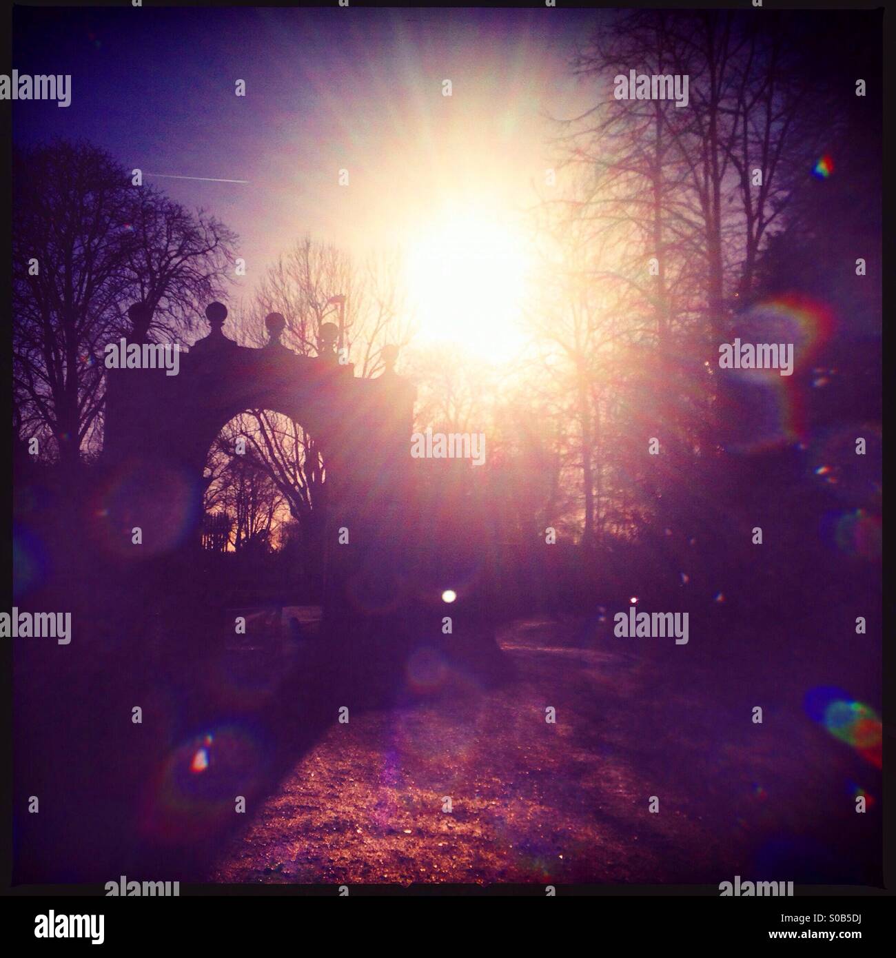 Sunshine and gate Stock Photo - Alamy