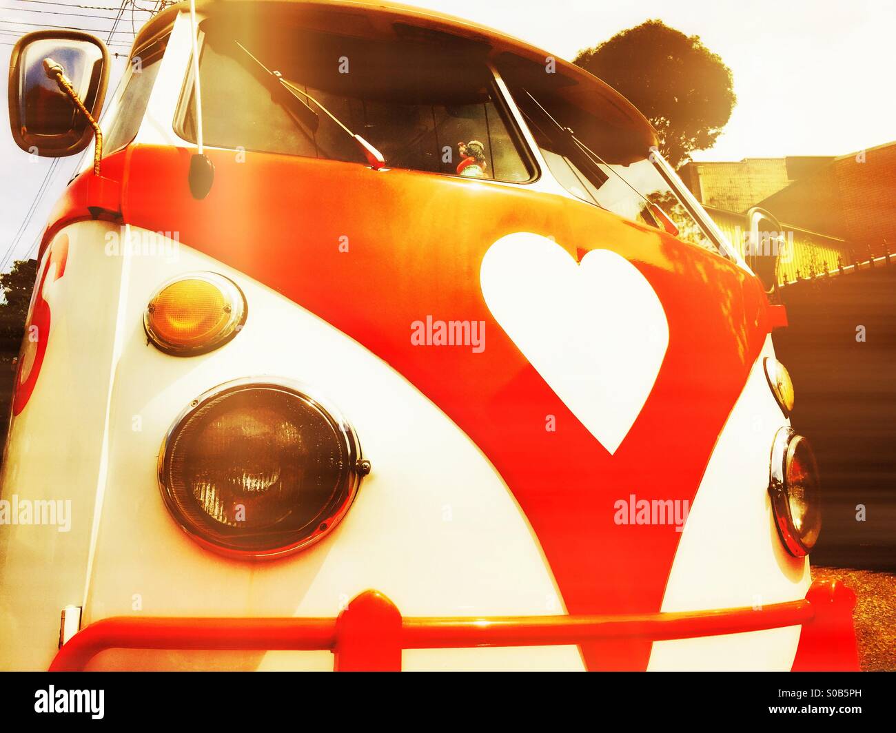 A vintage VW bus with a heart shaped logo Stock Photo - Alamy