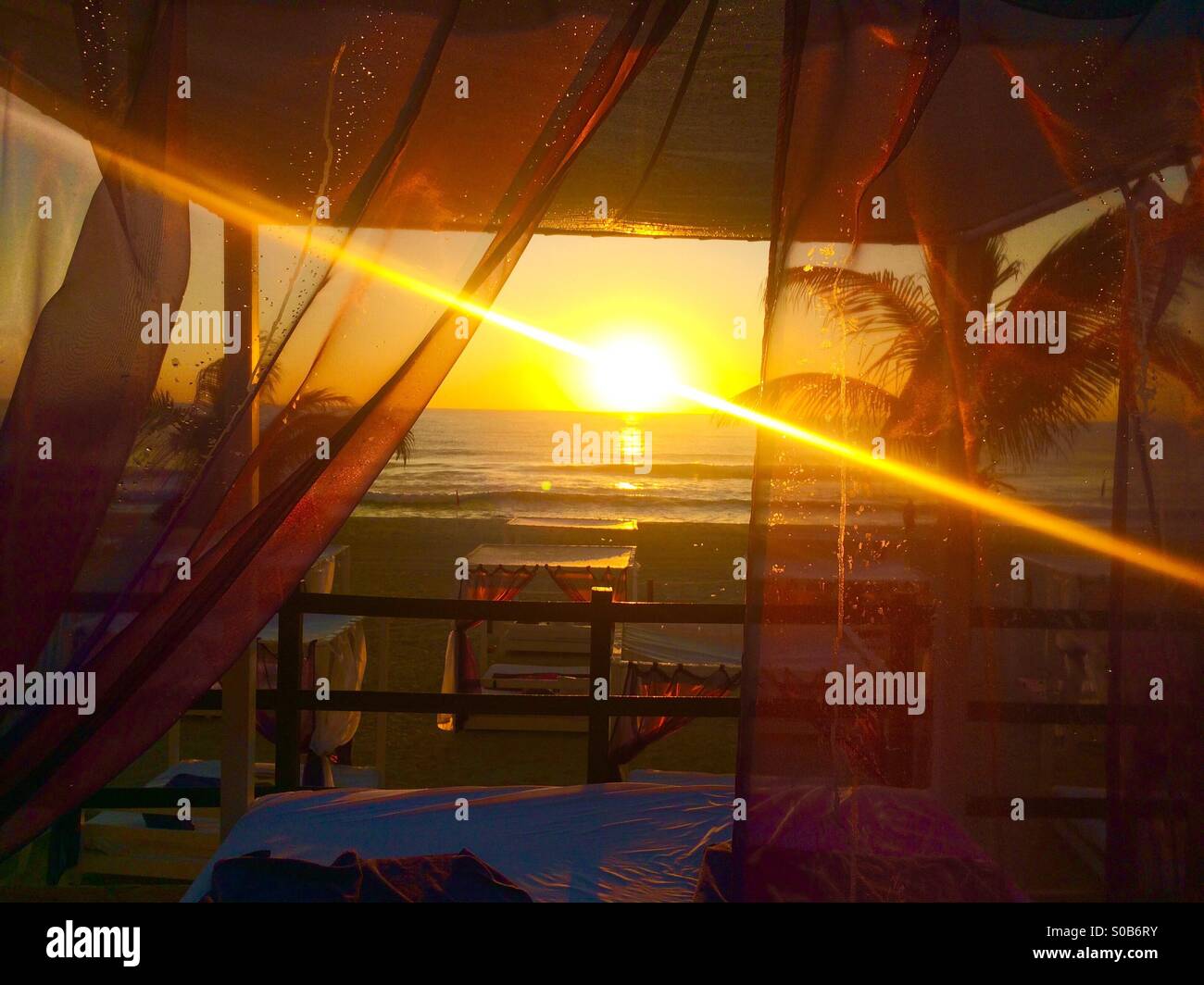 Beautiful morning sunrise at the beach Stock Photo - Alamy