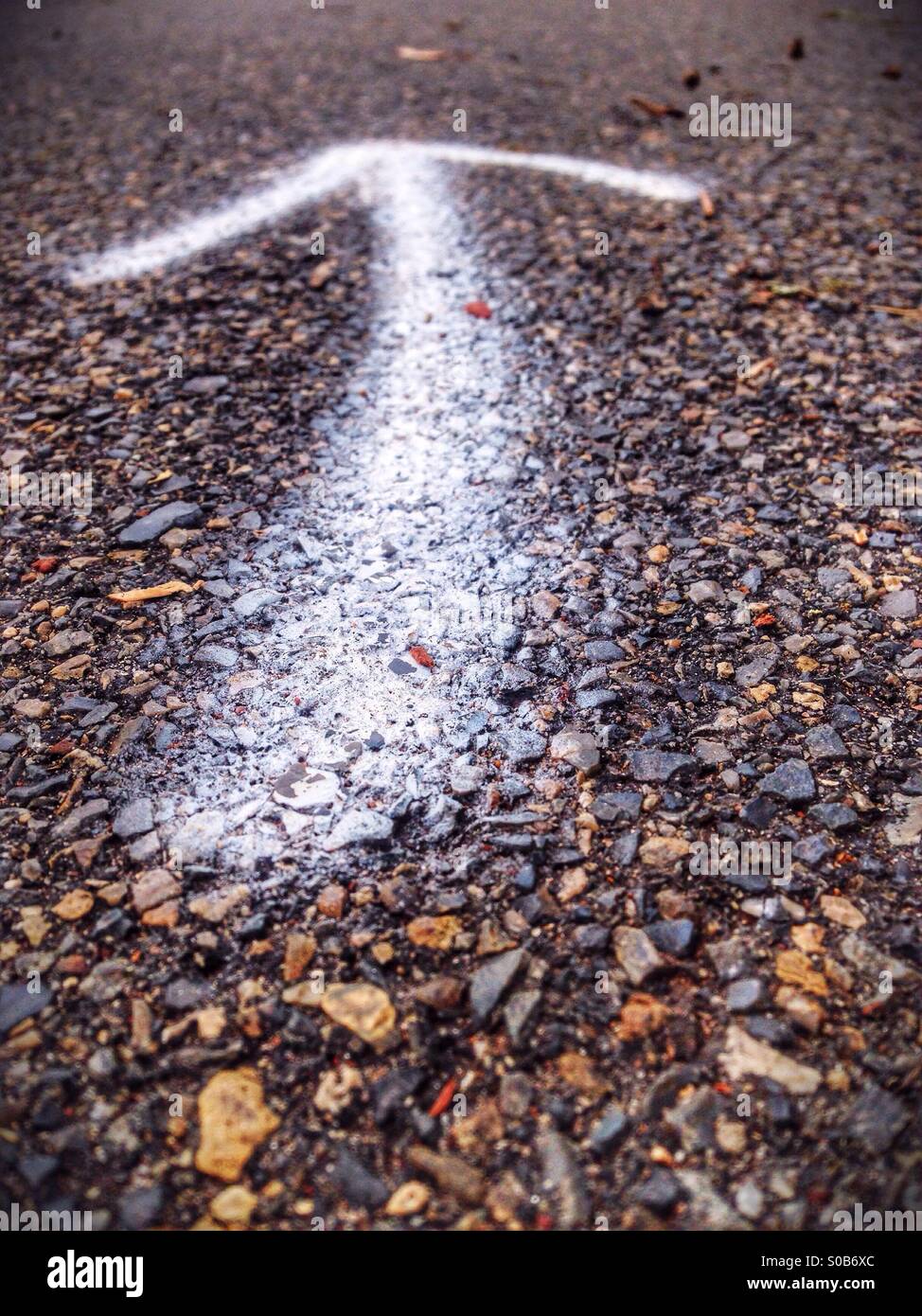 Arrow point to a direction to follow Stock Photo - Alamy