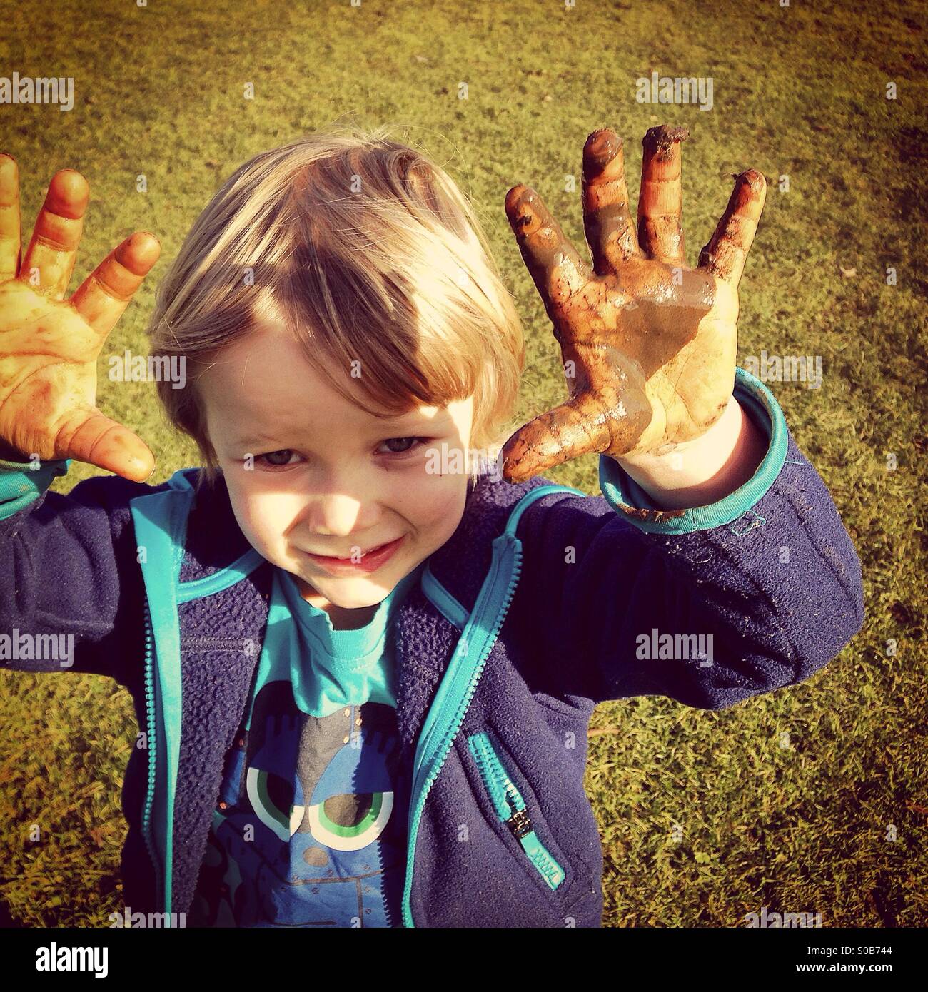 Child Dirty Hands Mud High Resolution Stock Photography and Images - Alamy