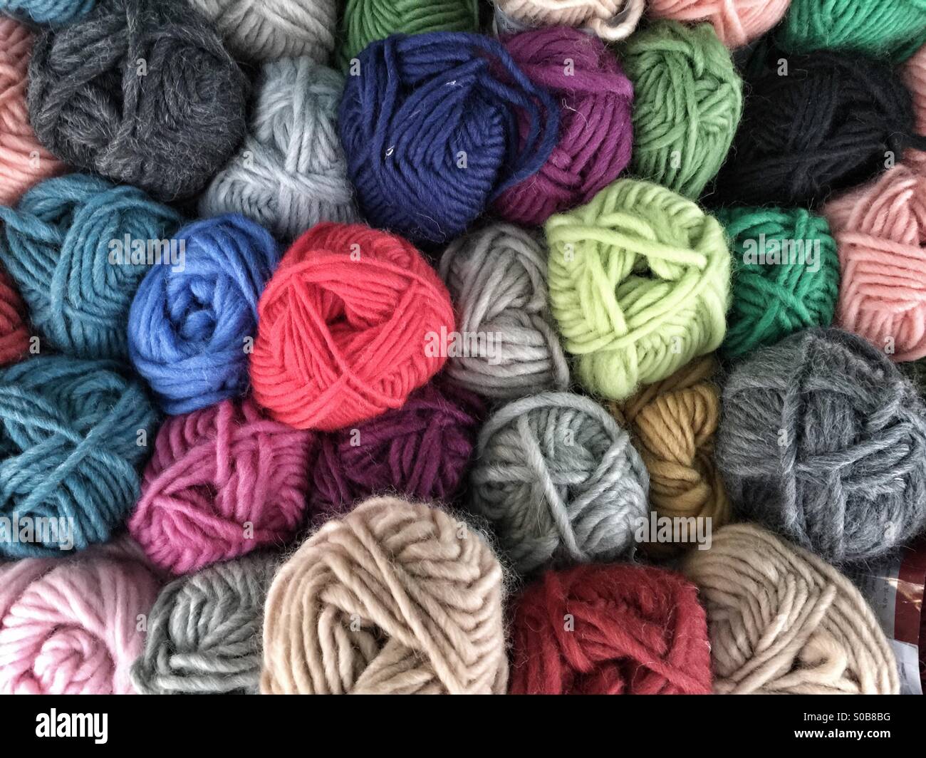 Colourful knitting wool Stock Photo - Alamy