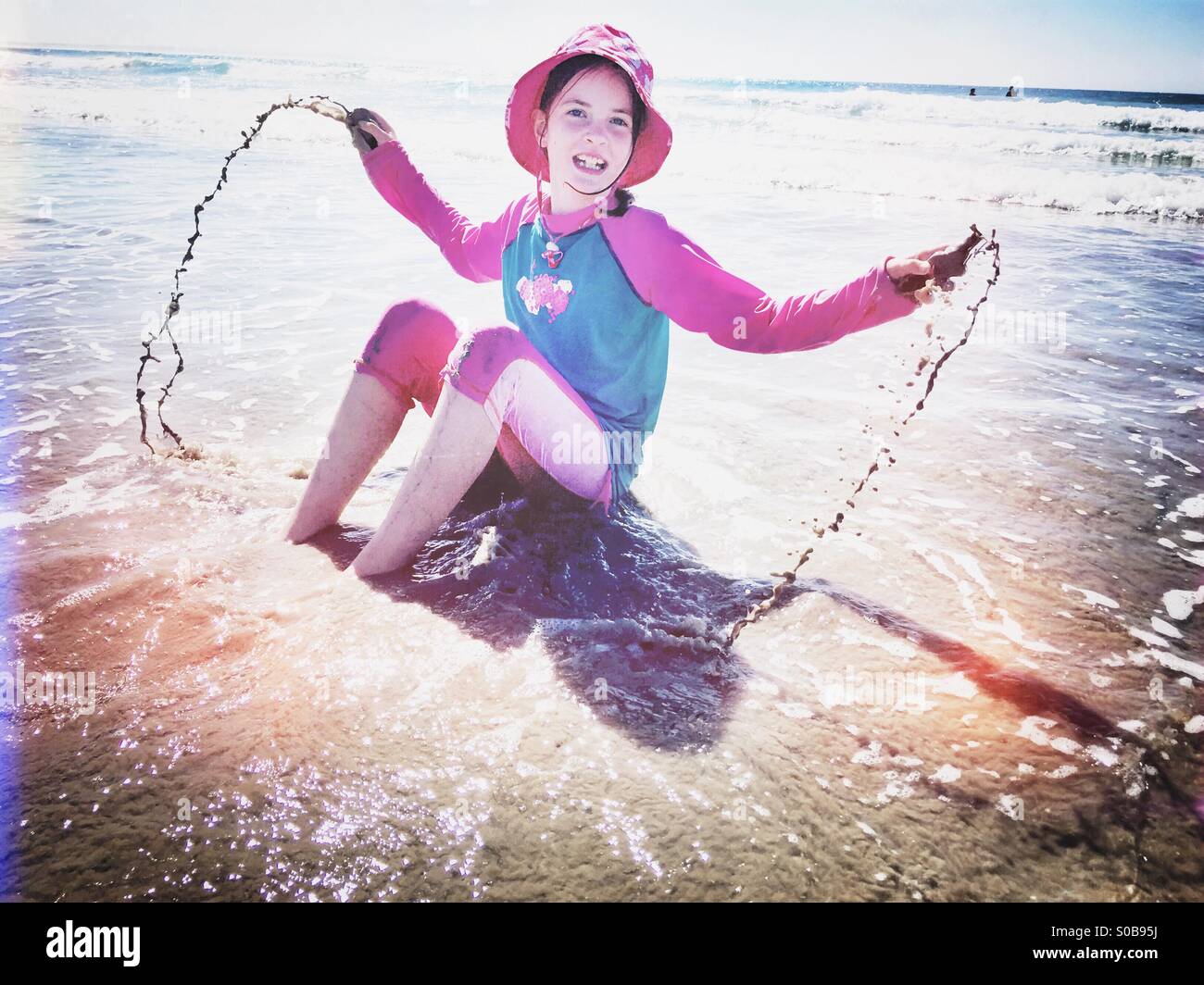 Children playing in sand water hi-res stock photography and images - Alamy