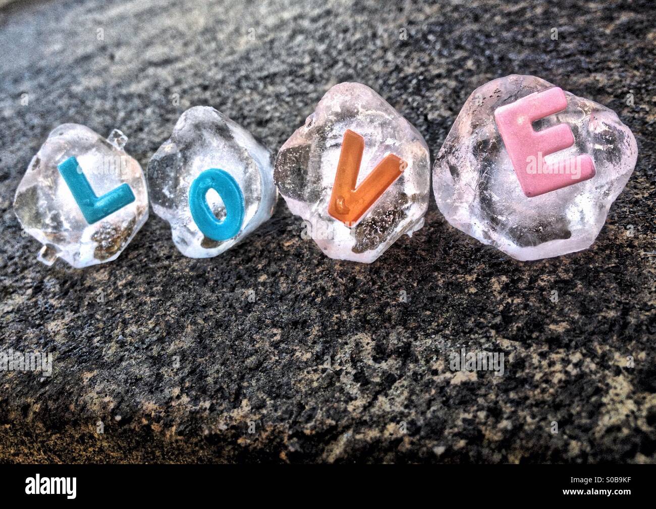 Letters in ice spelling love Stock Photo - Alamy