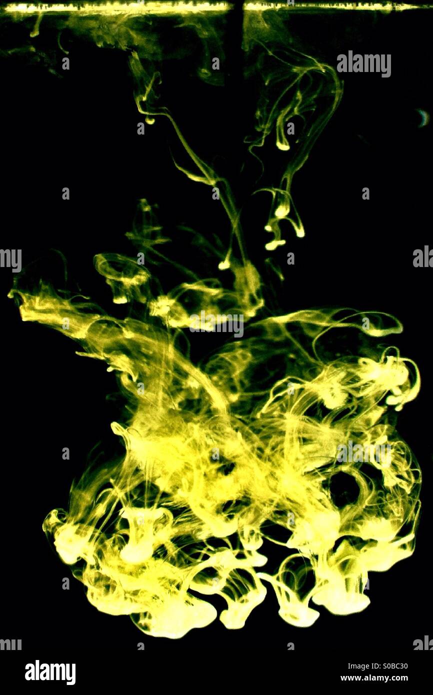 Colour inverted image of dye in water Stock Photo - Alamy