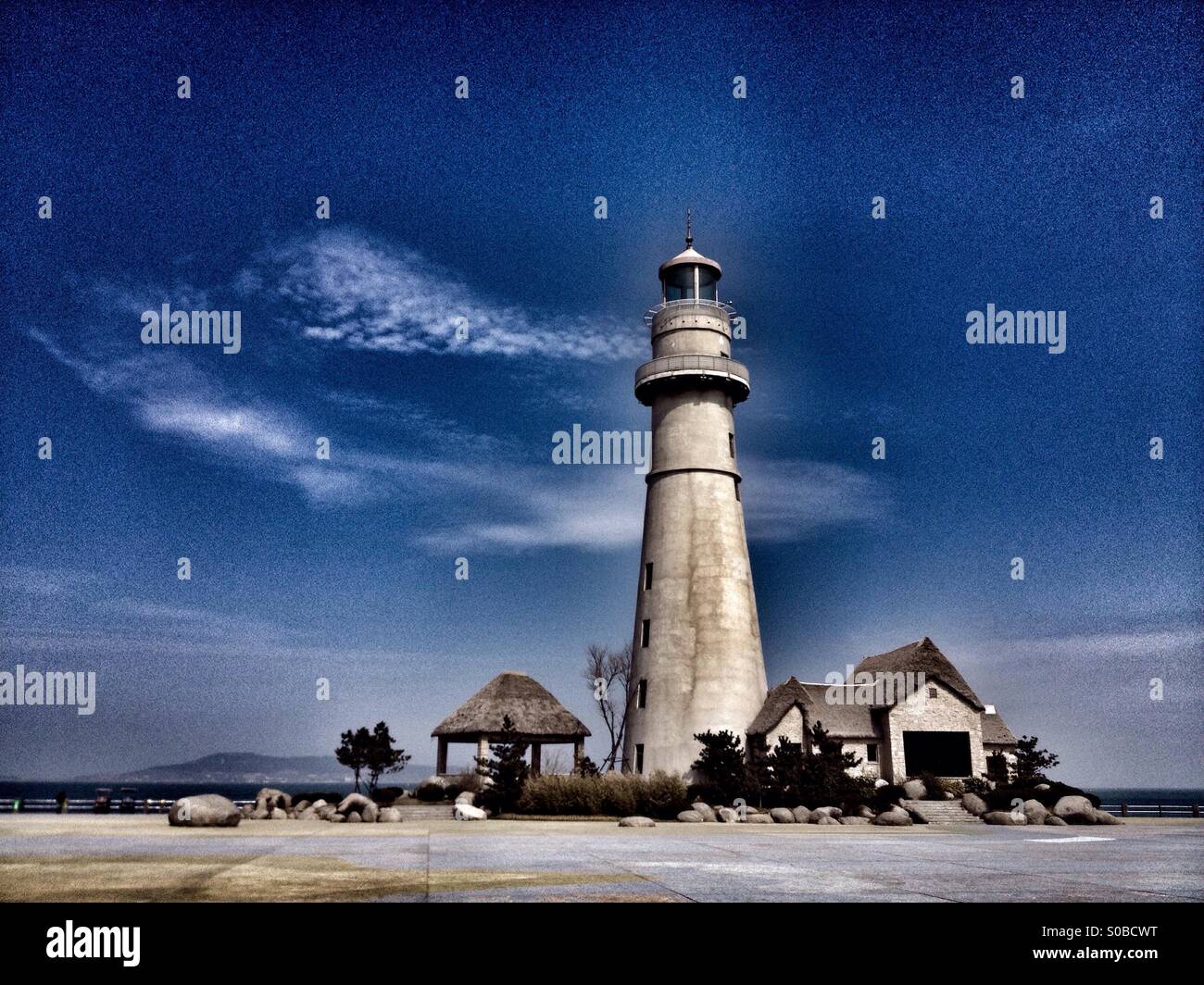 Lighthouse at beach Stock Photo - Alamy