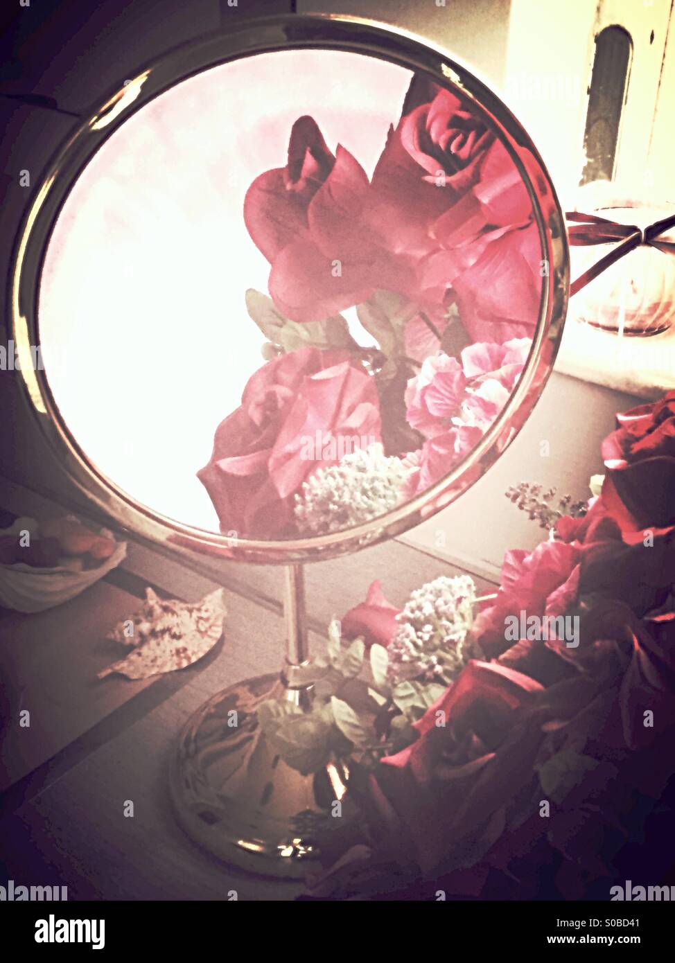 Roses in mirror Stock Photo - Alamy