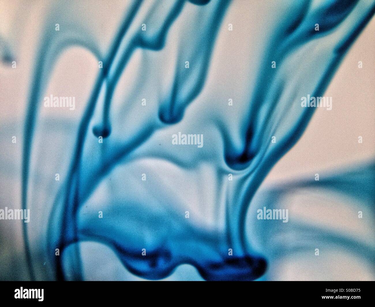 Swirling blue color in water smartphone stock photos and images - Alamy