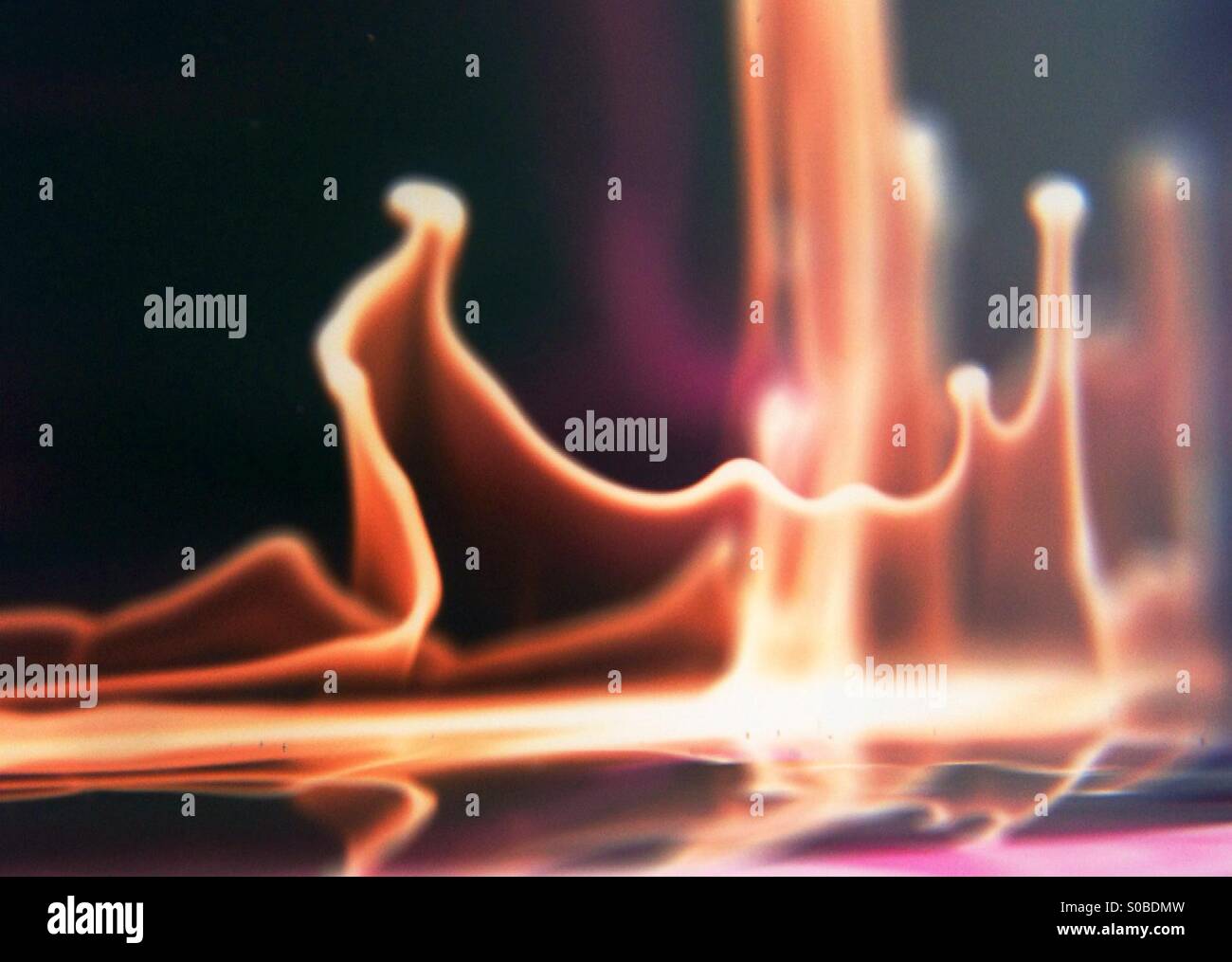 Movement of dye in water- colour inverted Stock Photo - Alamy