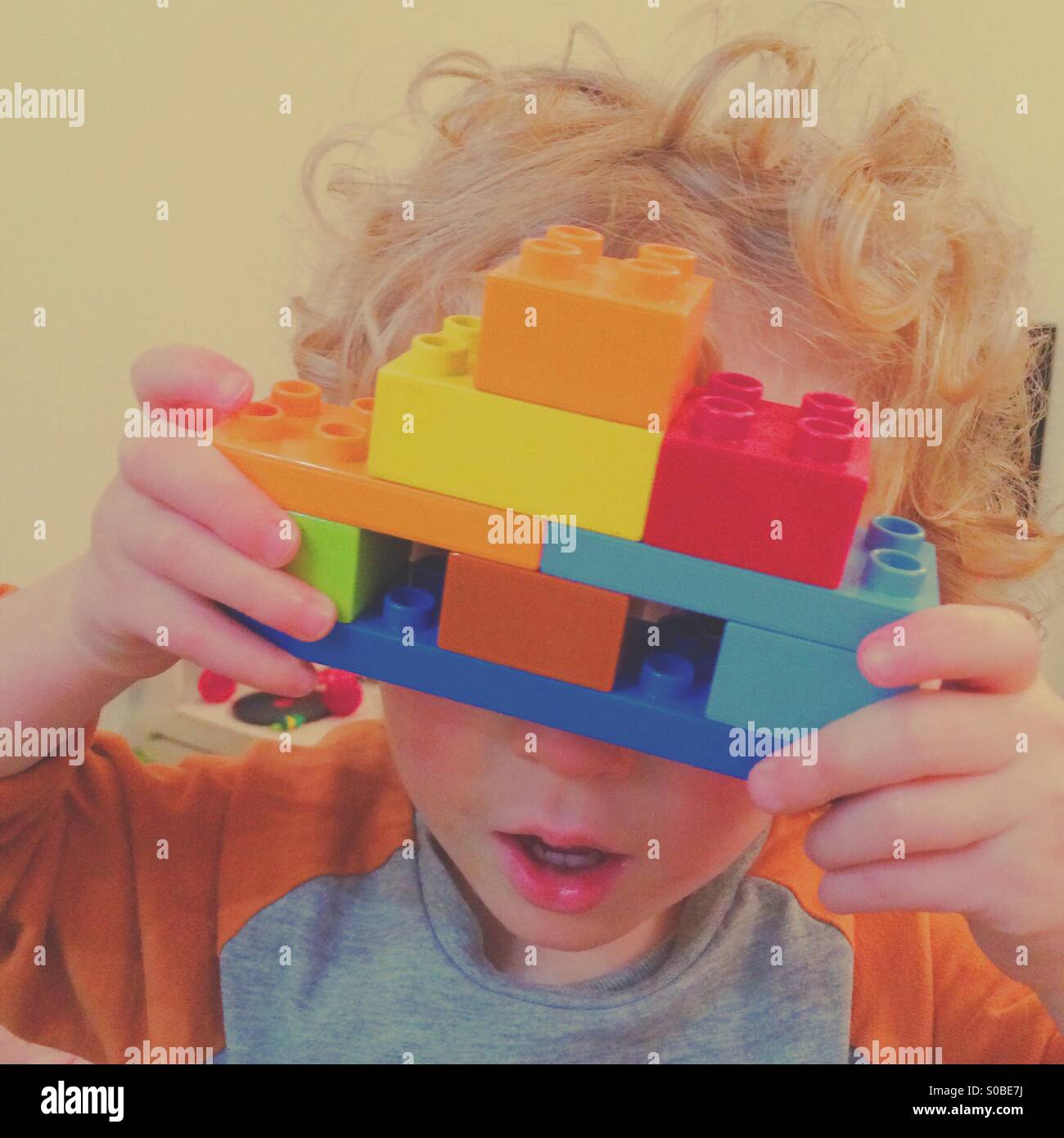 Boy playing lego bricks hi-res stock photography and images - Alamy