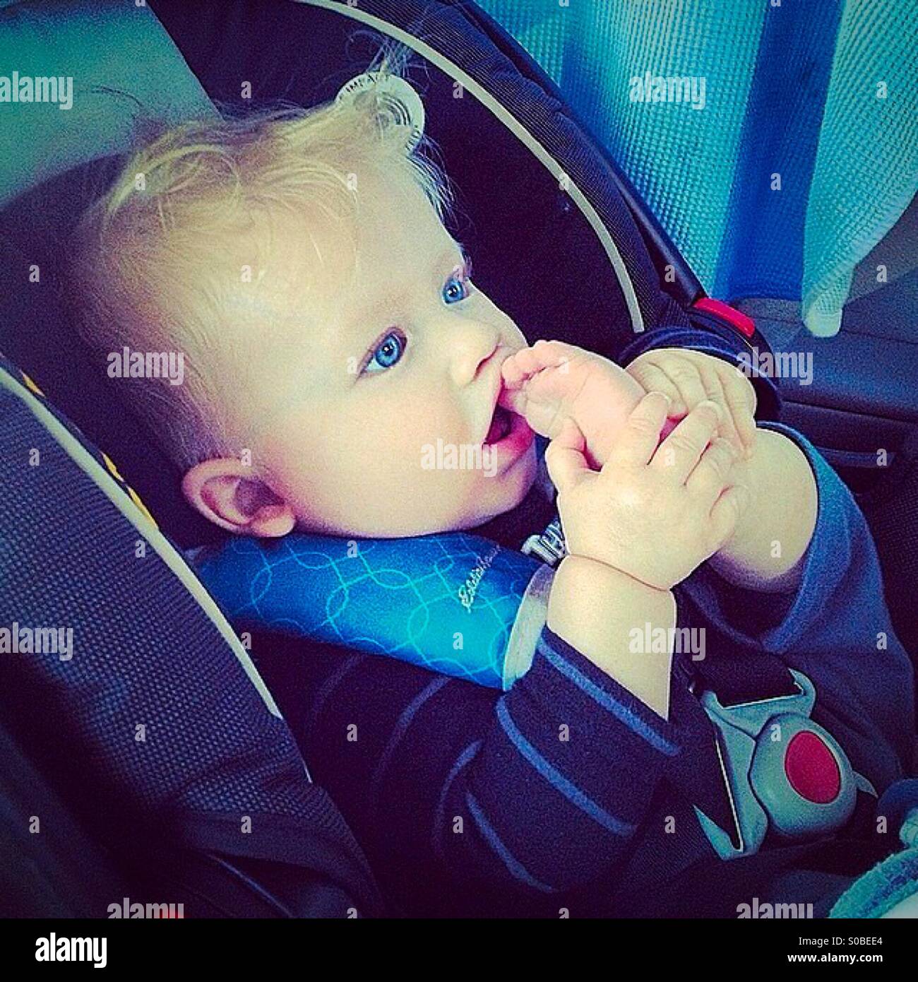 Child sucking foot hi-res stock photography and images - Alamy