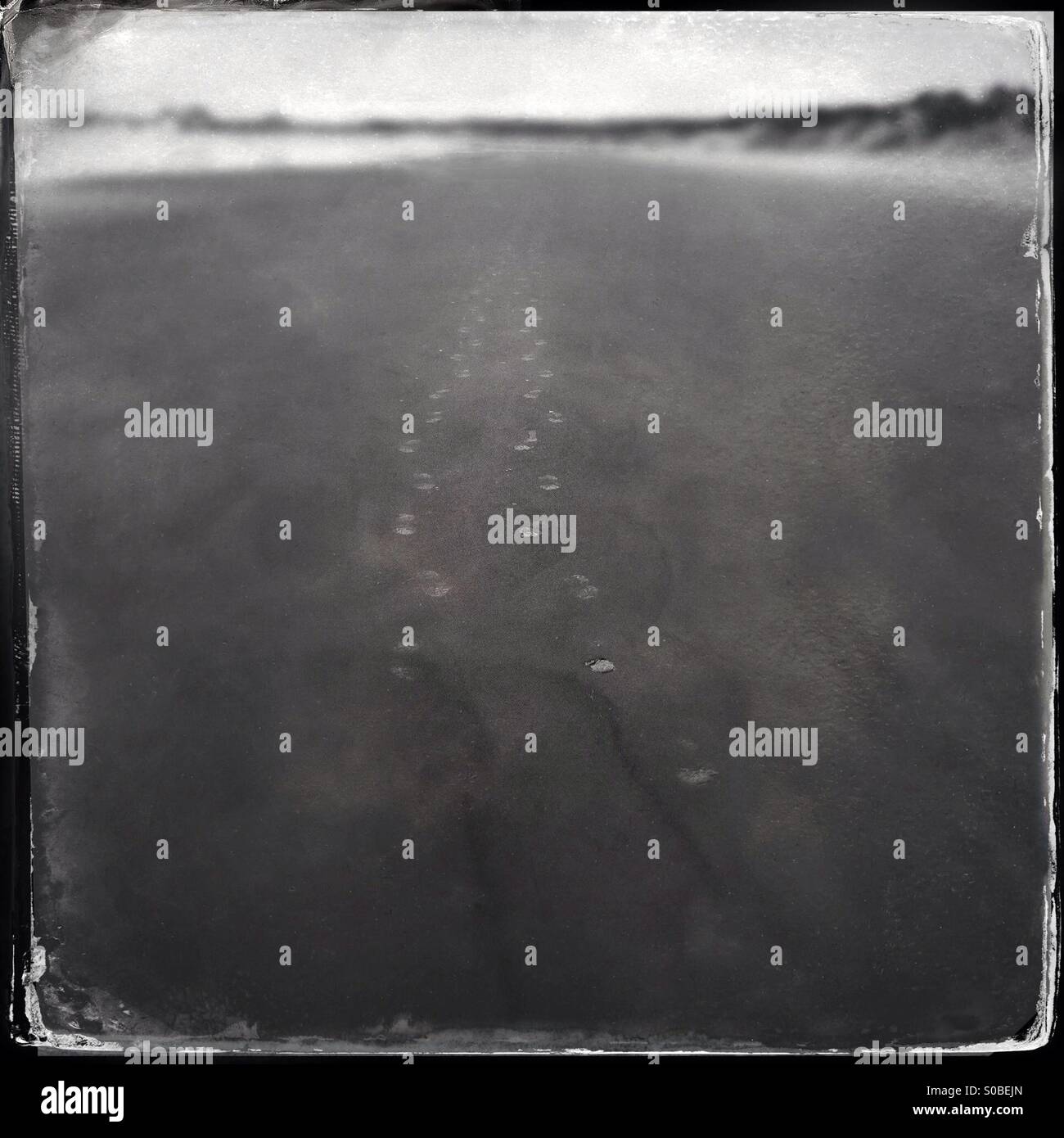 Footprints in the sand two sets hi-res stock photography and images - Alamy