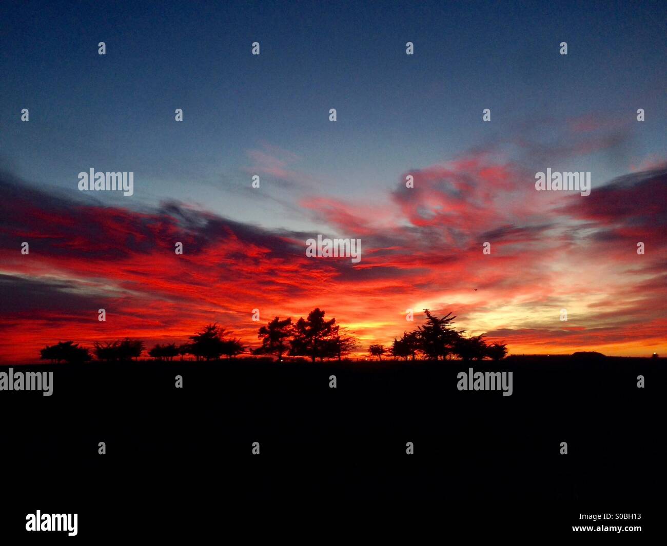 Sunrise down the road Stock Photo - Alamy