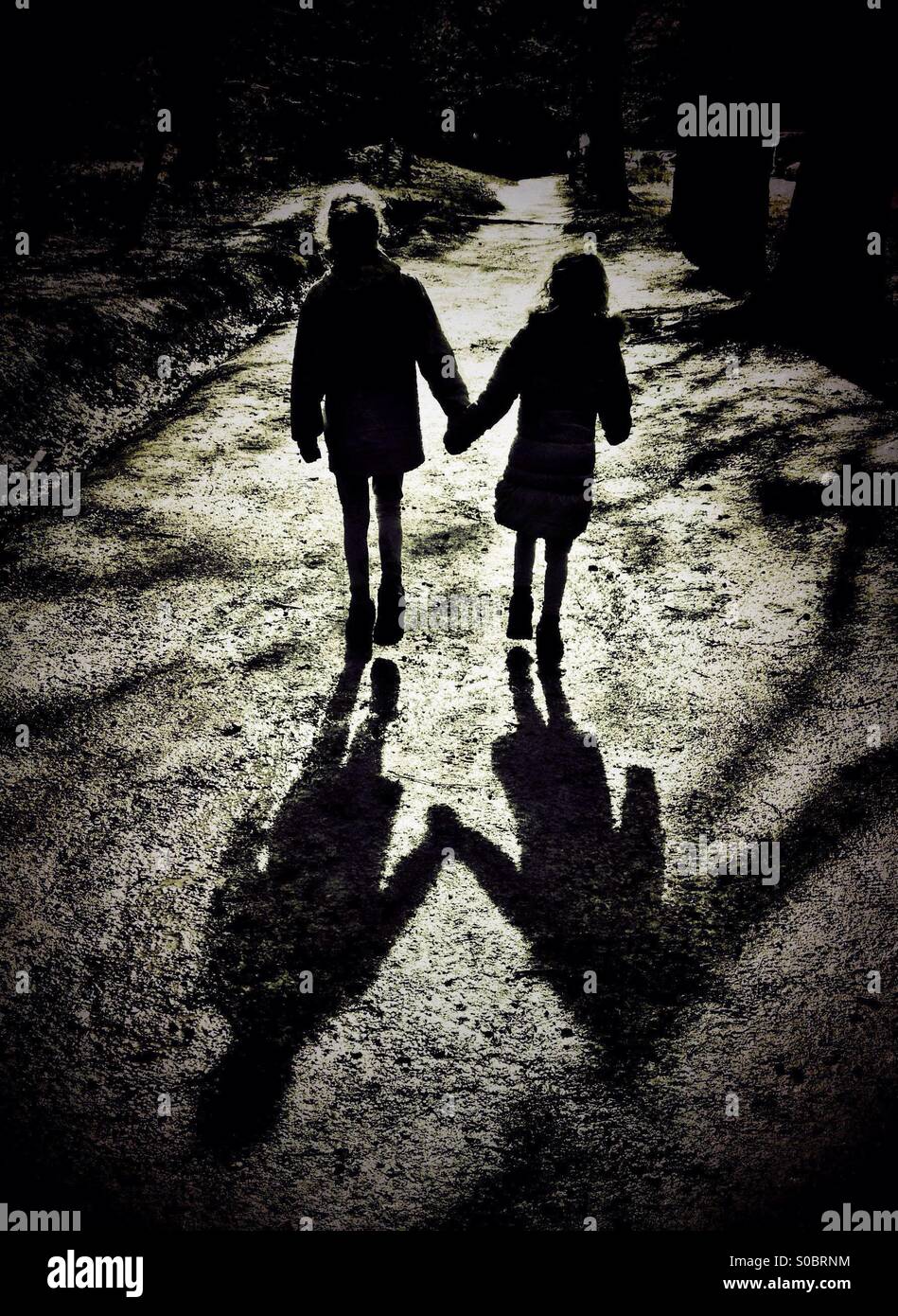 Shadow Of A Family With Two Teens