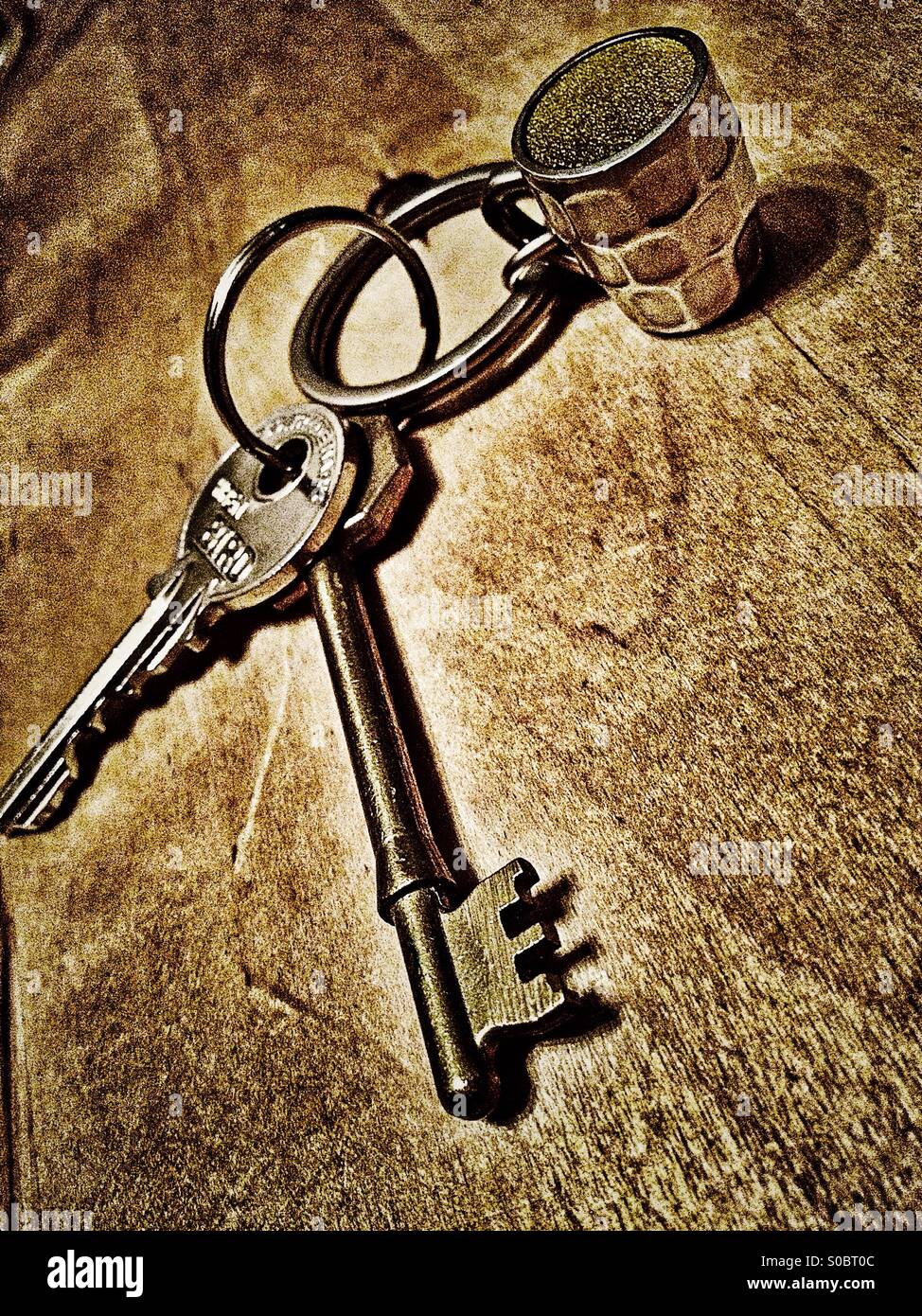Keys on beer jug key ring Stock Photo - Alamy