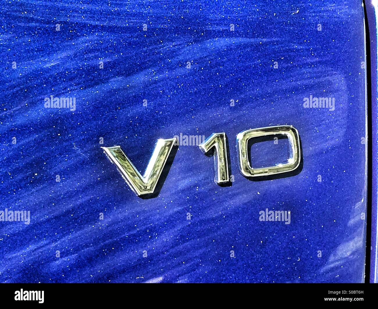 An Audi R8 with a speckled blue paint job has a V 10 engine Stock Photo ...