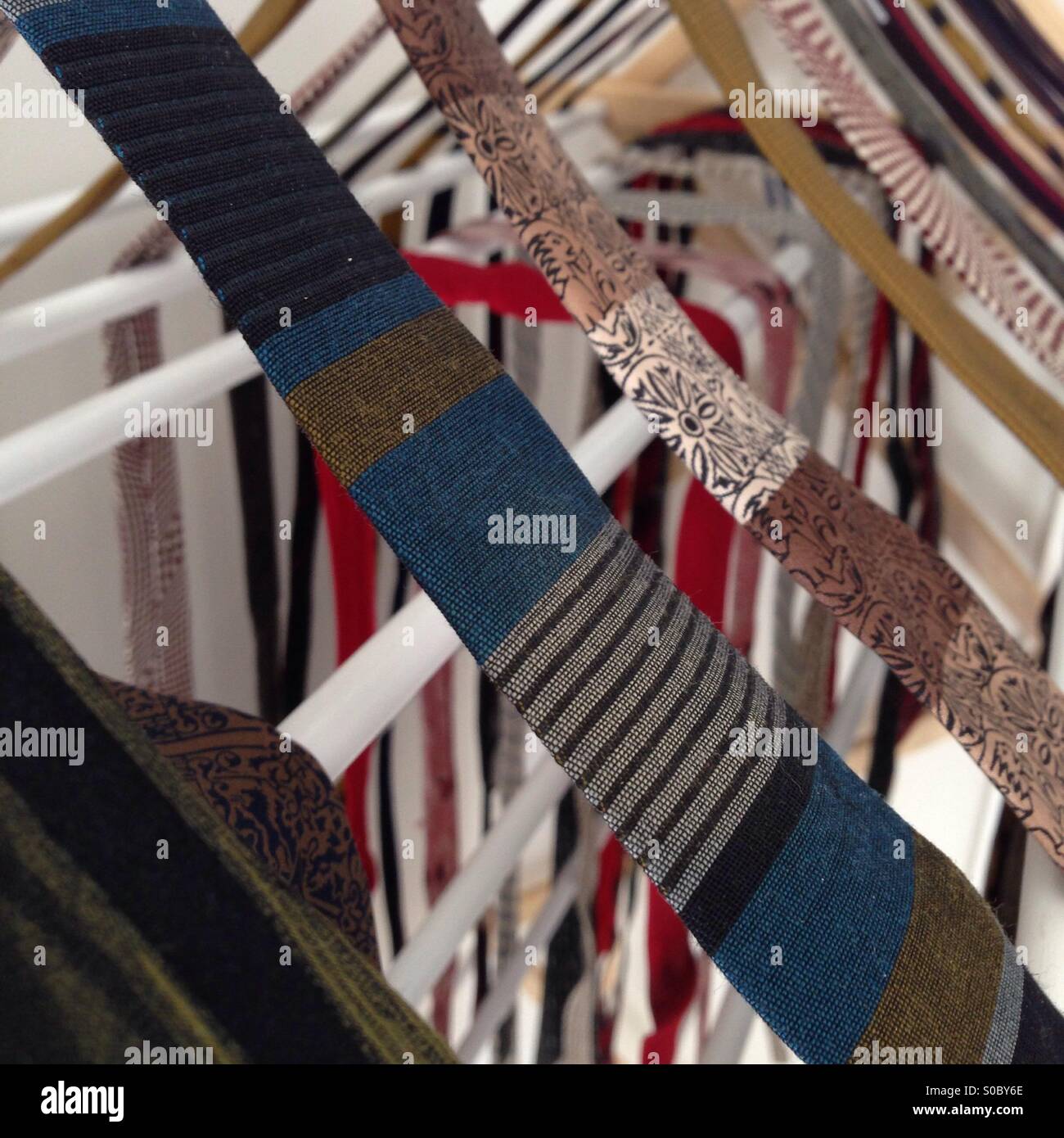 Ties drying on a rack after washing Stock Photo - Alamy