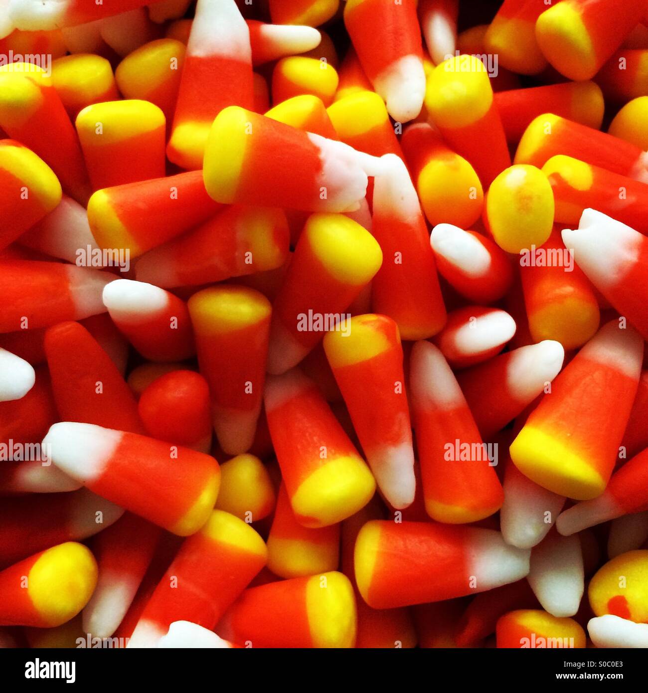 Yellow orange and white candy corn hi-res stock photography and images ...