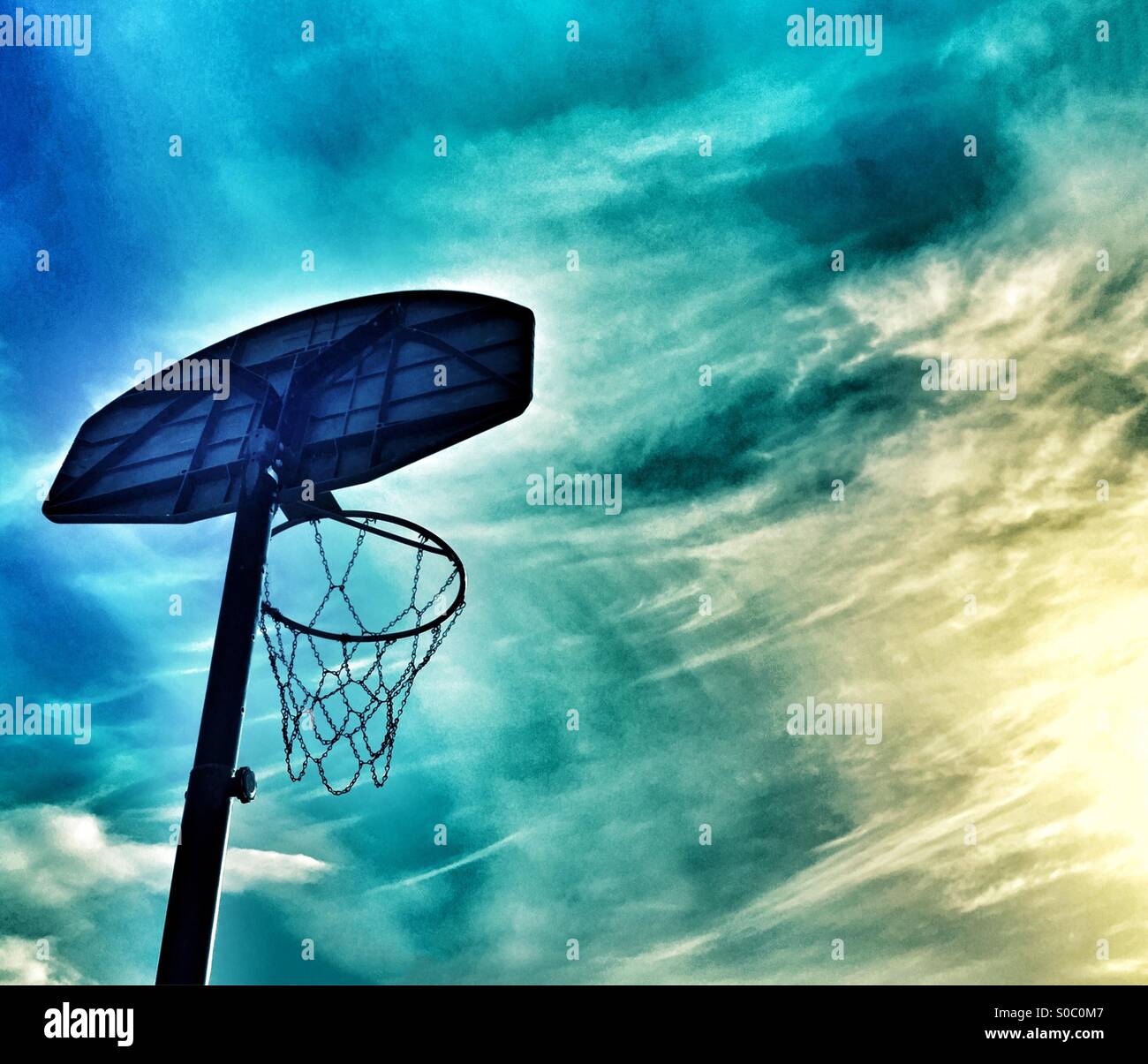 Basketball Hoop With Room For Text On A Dramatic Sky Stock Photo - Alamy