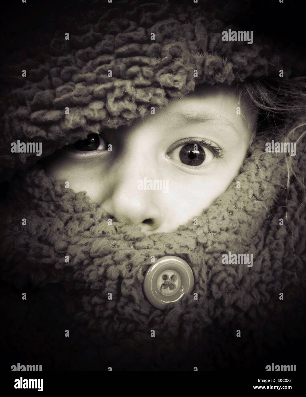 Young girl wearing furry balaclava Stock Photo - Alamy