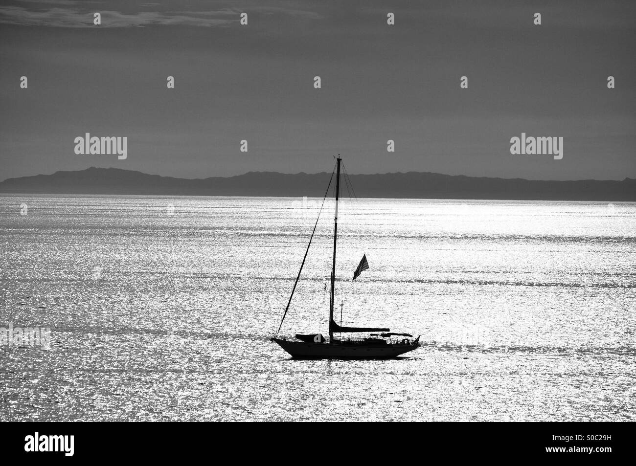 Boat at sunset Stock Photo - Alamy