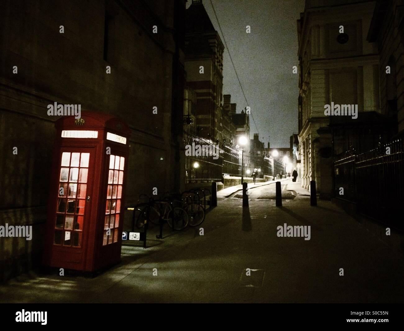 Telephone box and dark street Stock Photo - Alamy