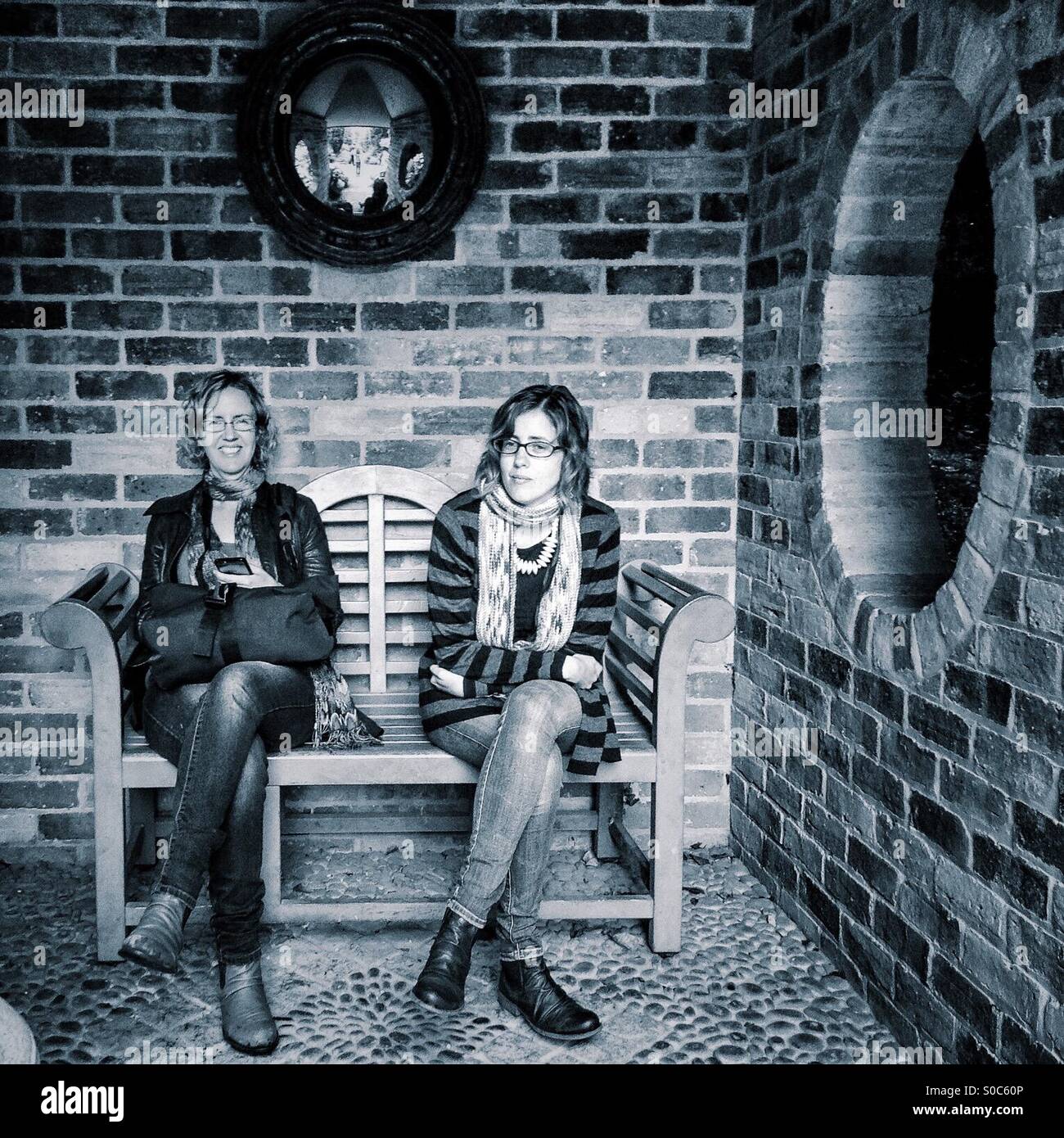 Sisters sitting hi-res stock photography and images - Alamy