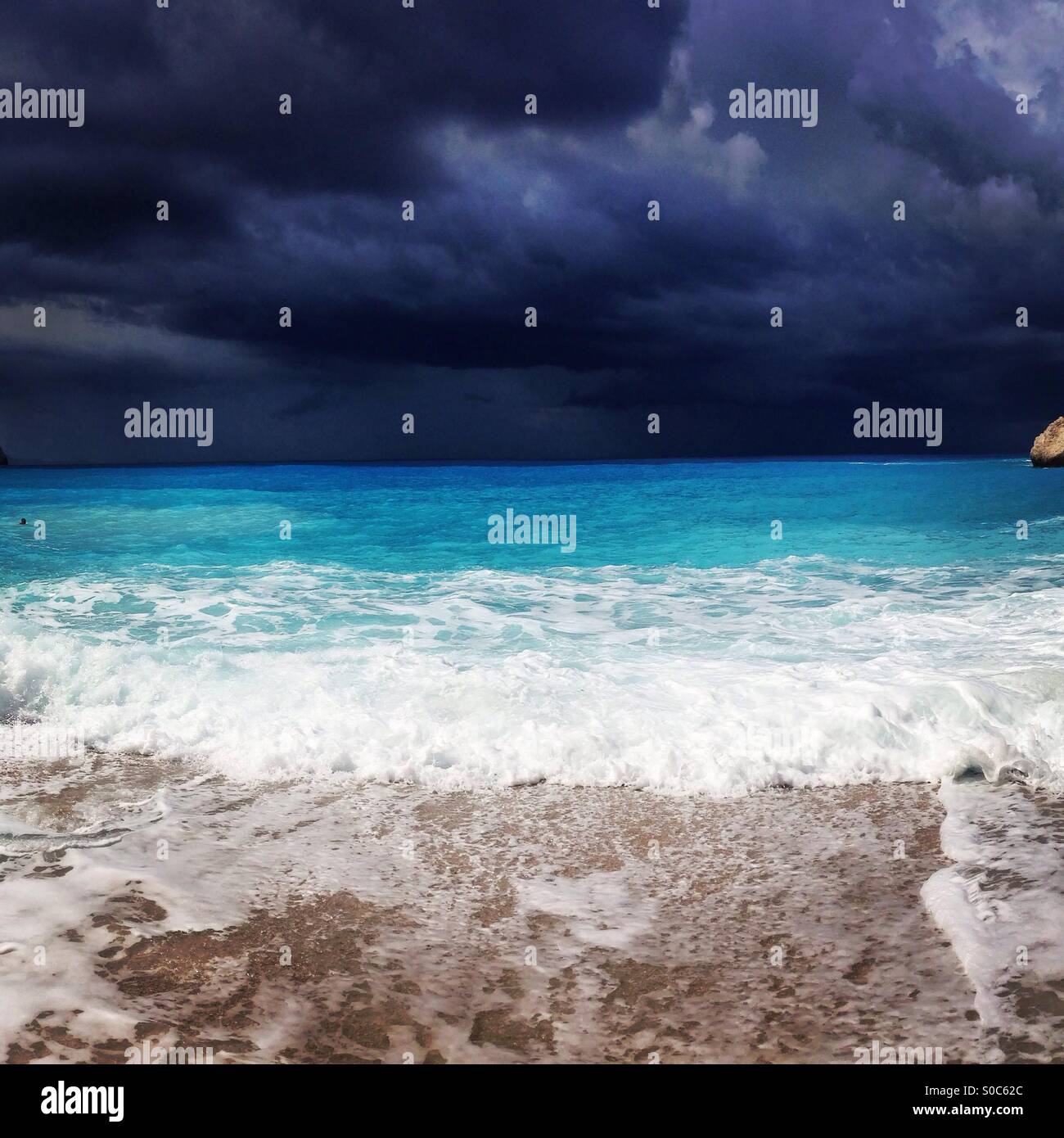 Storm on beach Stock Photo - Alamy