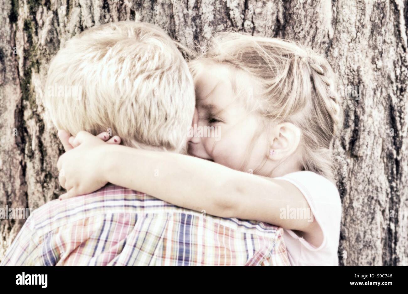 Telling secrets boy hi-res stock photography and images - Alamy