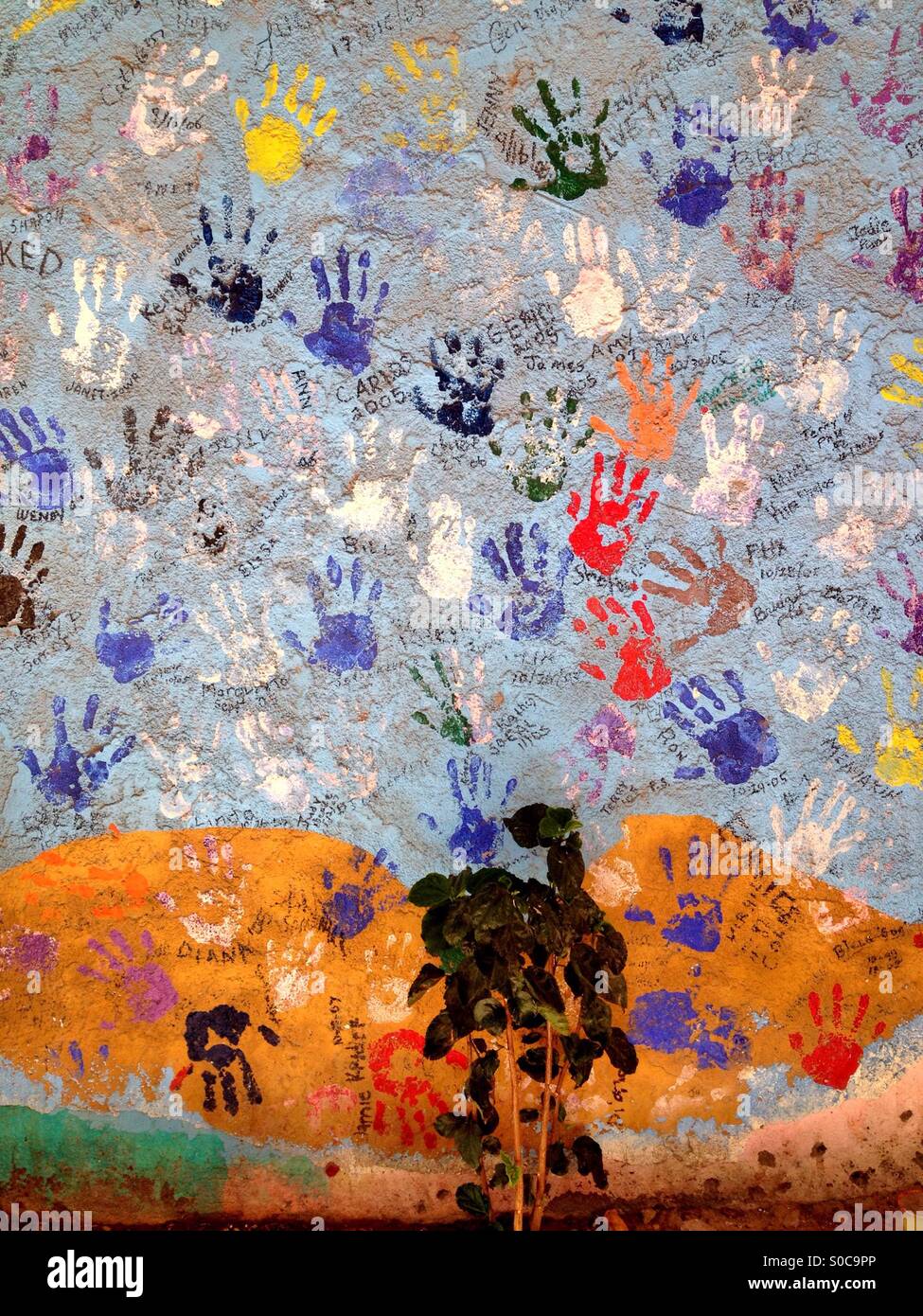 Handprints on wall in mexico Stock Photo - Alamy