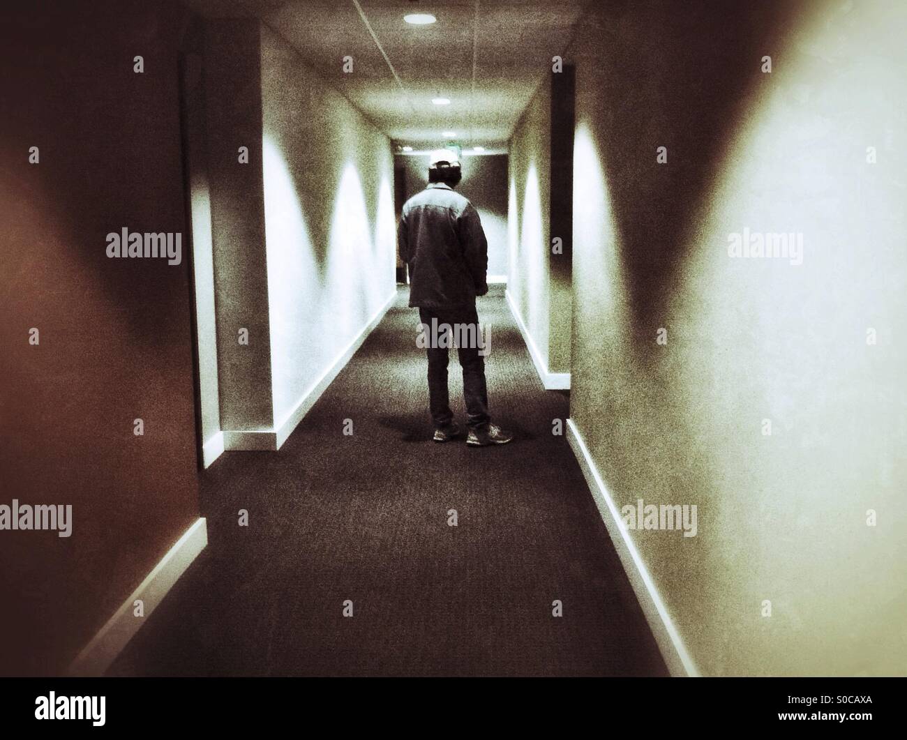A man in a hallway Stock Photo - Alamy