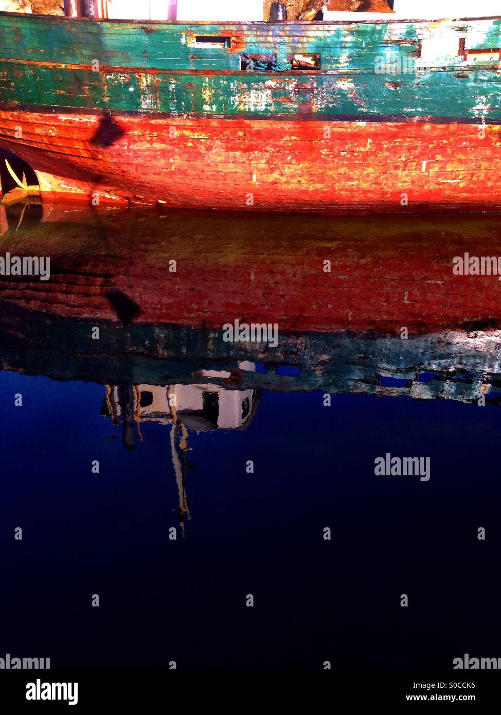 Fishing Boat Reflections Stock Photo - Alamy