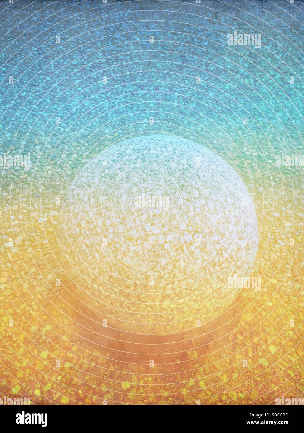 Spherical stone bench with pebble-like surface, with overlay of blue ...