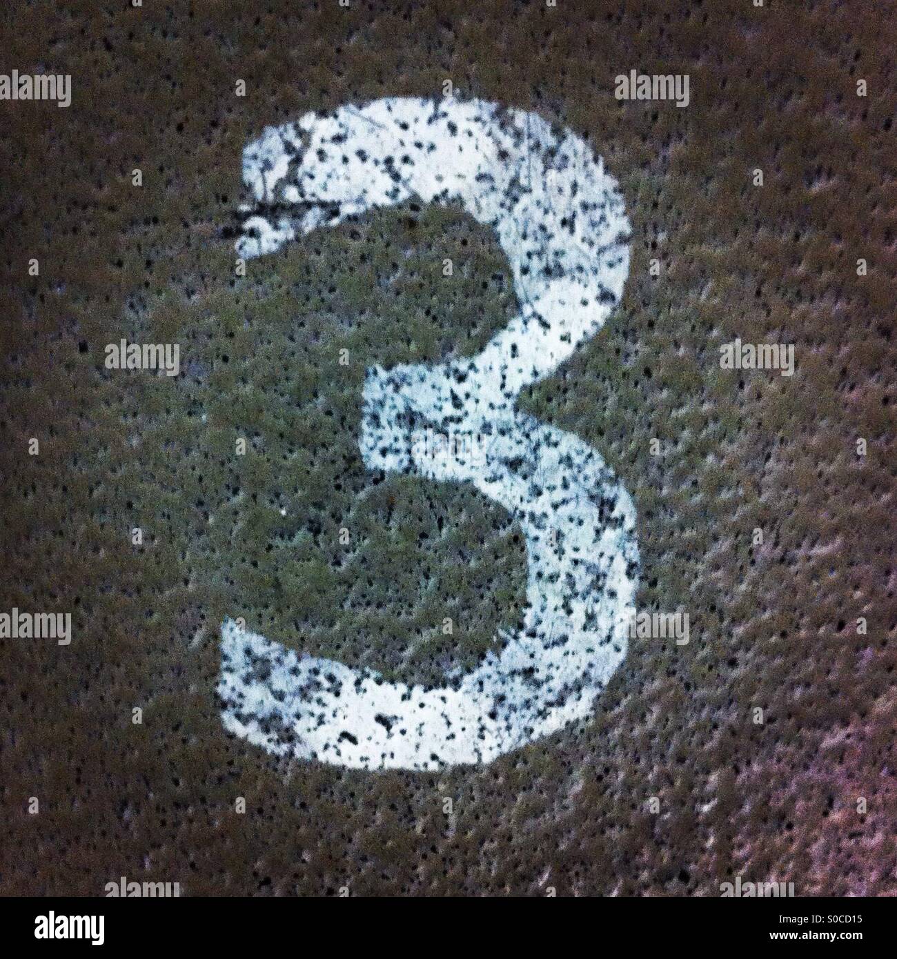 Number 3 painted on the floor Stock Photo - Alamy