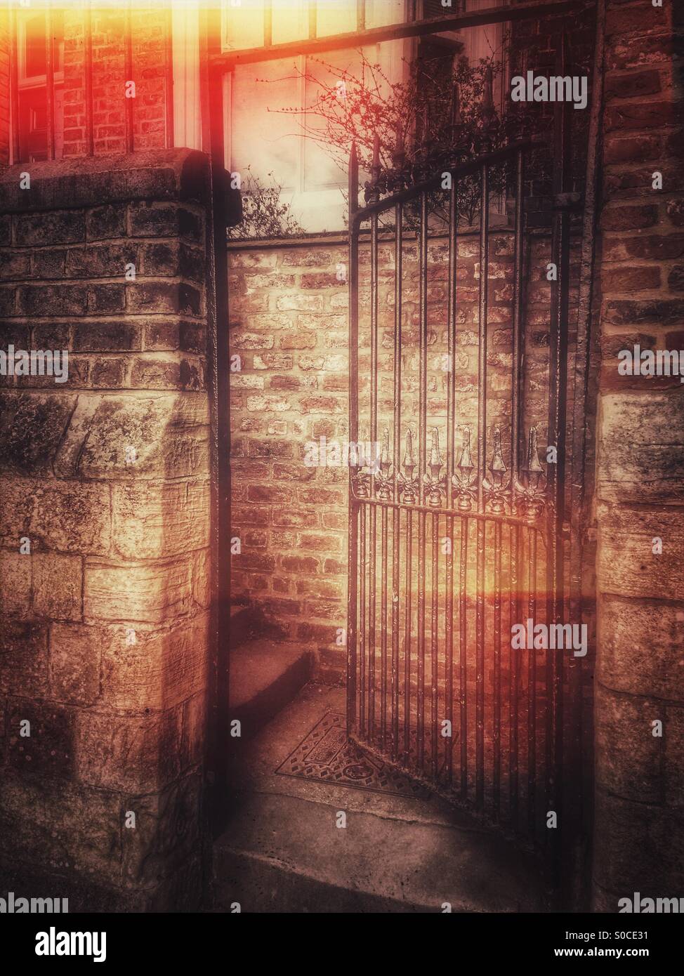 Open iron gate Stock Photo - Alamy