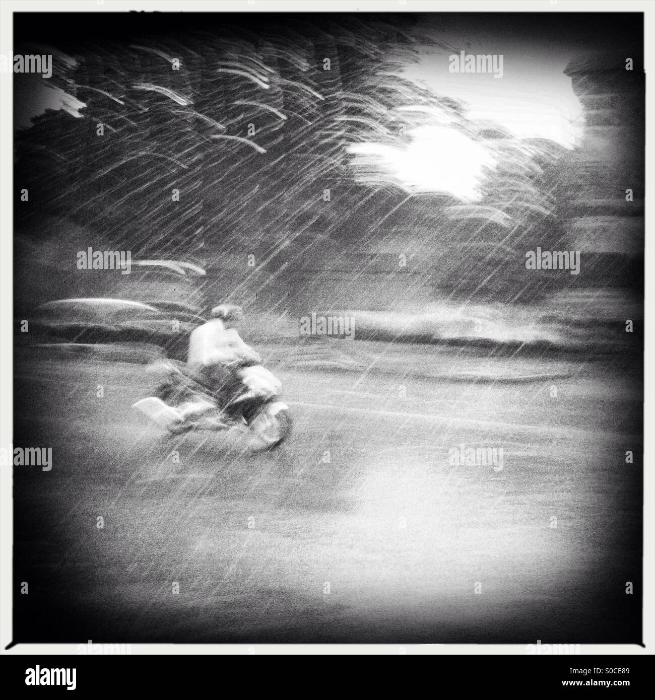Moped vietnam rain hi-res stock photography and images - Alamy