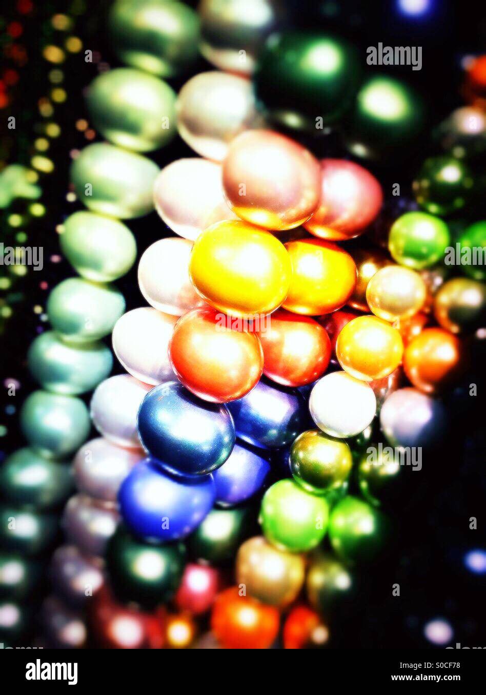 Multiple strings of beads hi-res stock photography and images - Alamy
