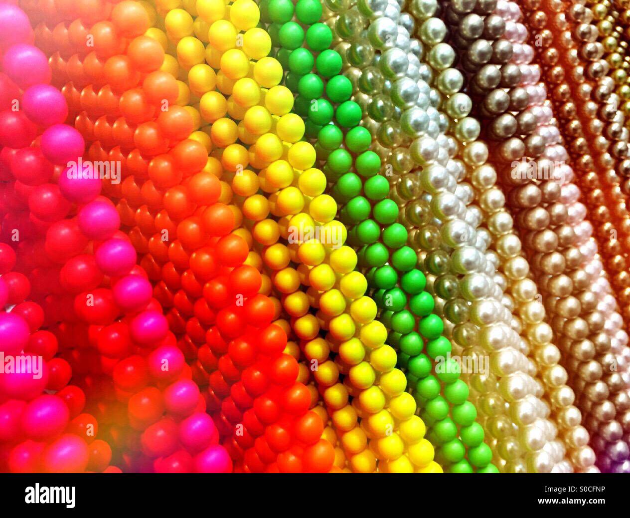 Multiple strings of beads hi-res stock photography and images - Alamy