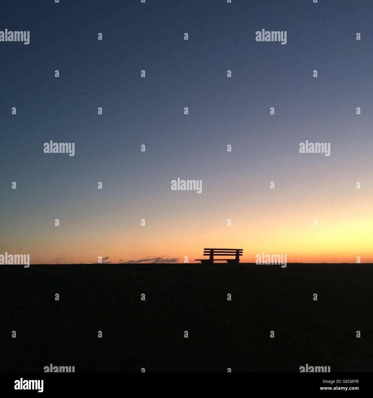 Lonely bench sunset hi-res stock photography and images - Alamy